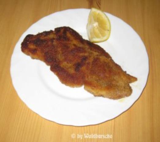 Paniertes Schweineschnitzel - Rezept mit Bild - kochbar.de