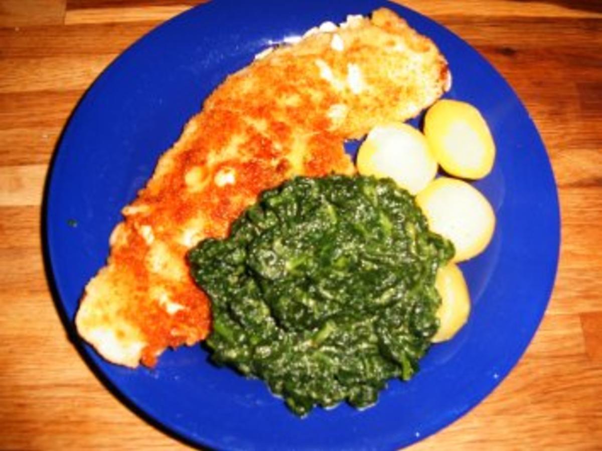 Gebratenes Dorschfilet in einer knusprigen nussigen Käsepanade an ...